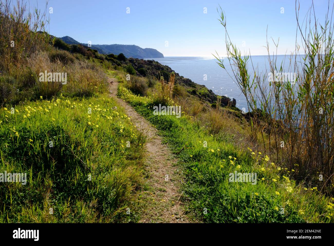 A Mediterranean coastal walk along the cliffs at Acantilados de Maro ...