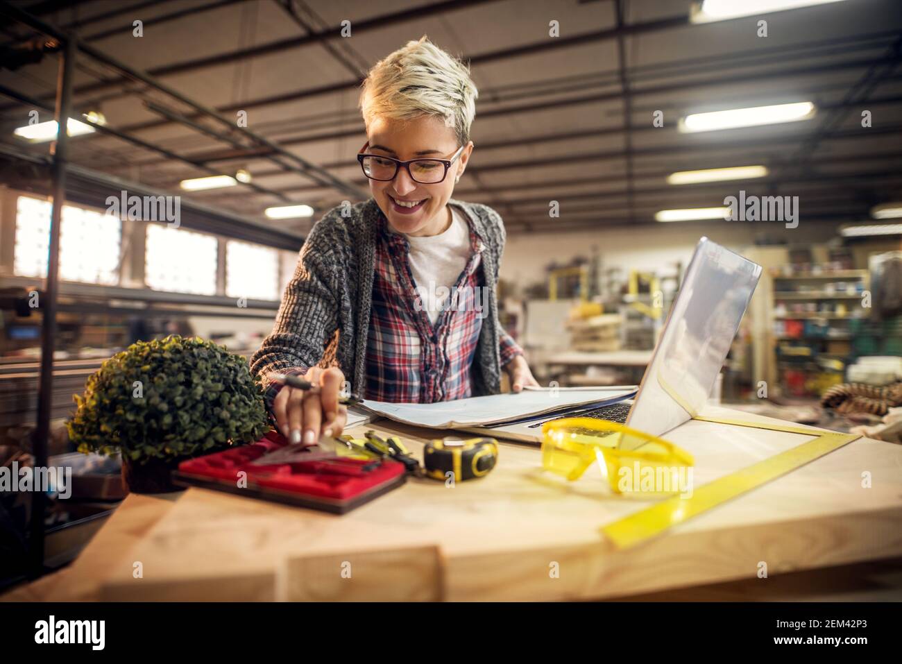 Close up of charming short hair attractive middle aged industrial ...