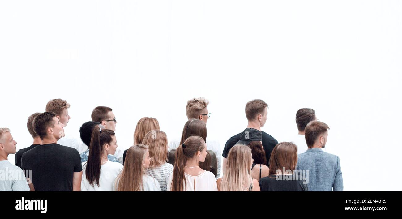 rear view. a group of young people looking in one direction Stock Photo ...