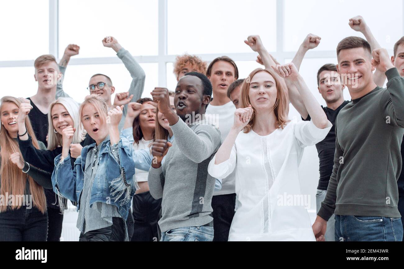 close up. a fun group of friends standing together Stock Photo - Alamy
