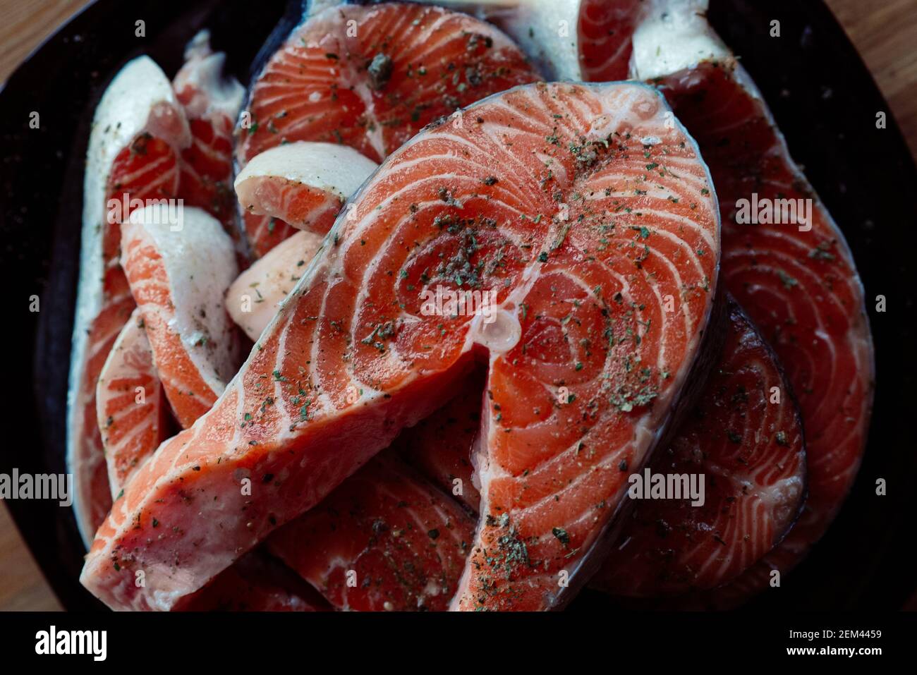 red fish spices cooking seafood delicacy on a plate Stock Photo - Alamy