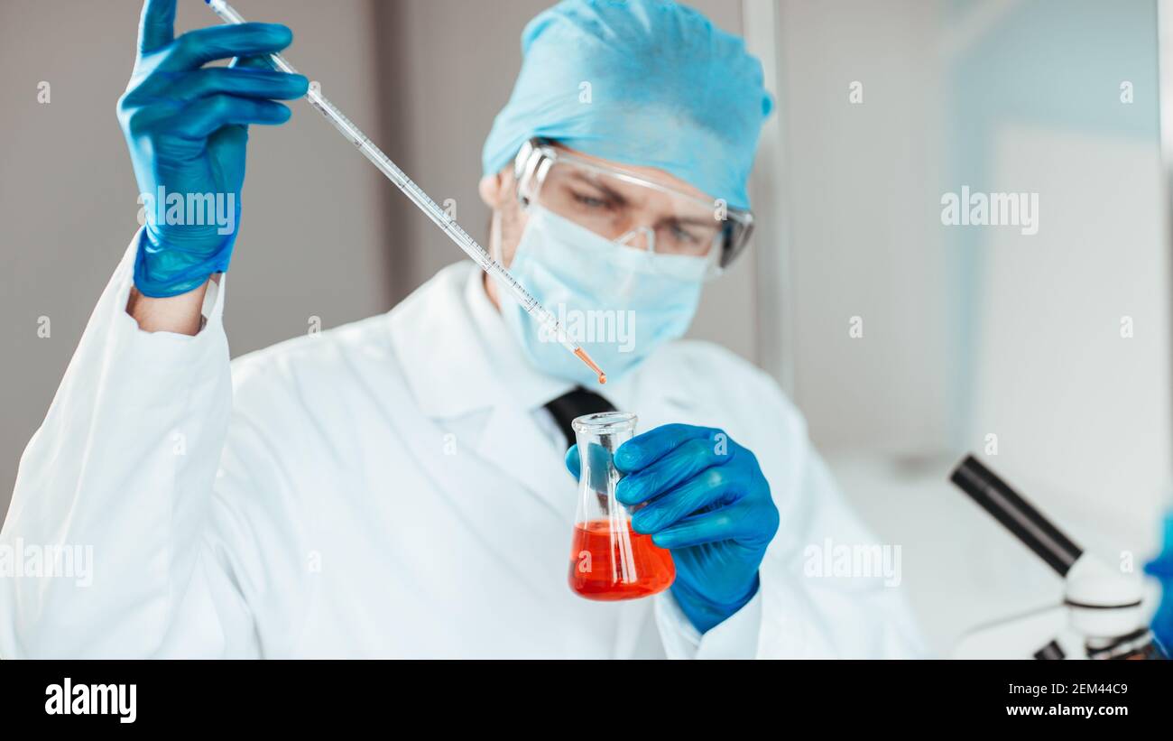 close up. scientist testing blood in the lab Stock Photo - Alamy