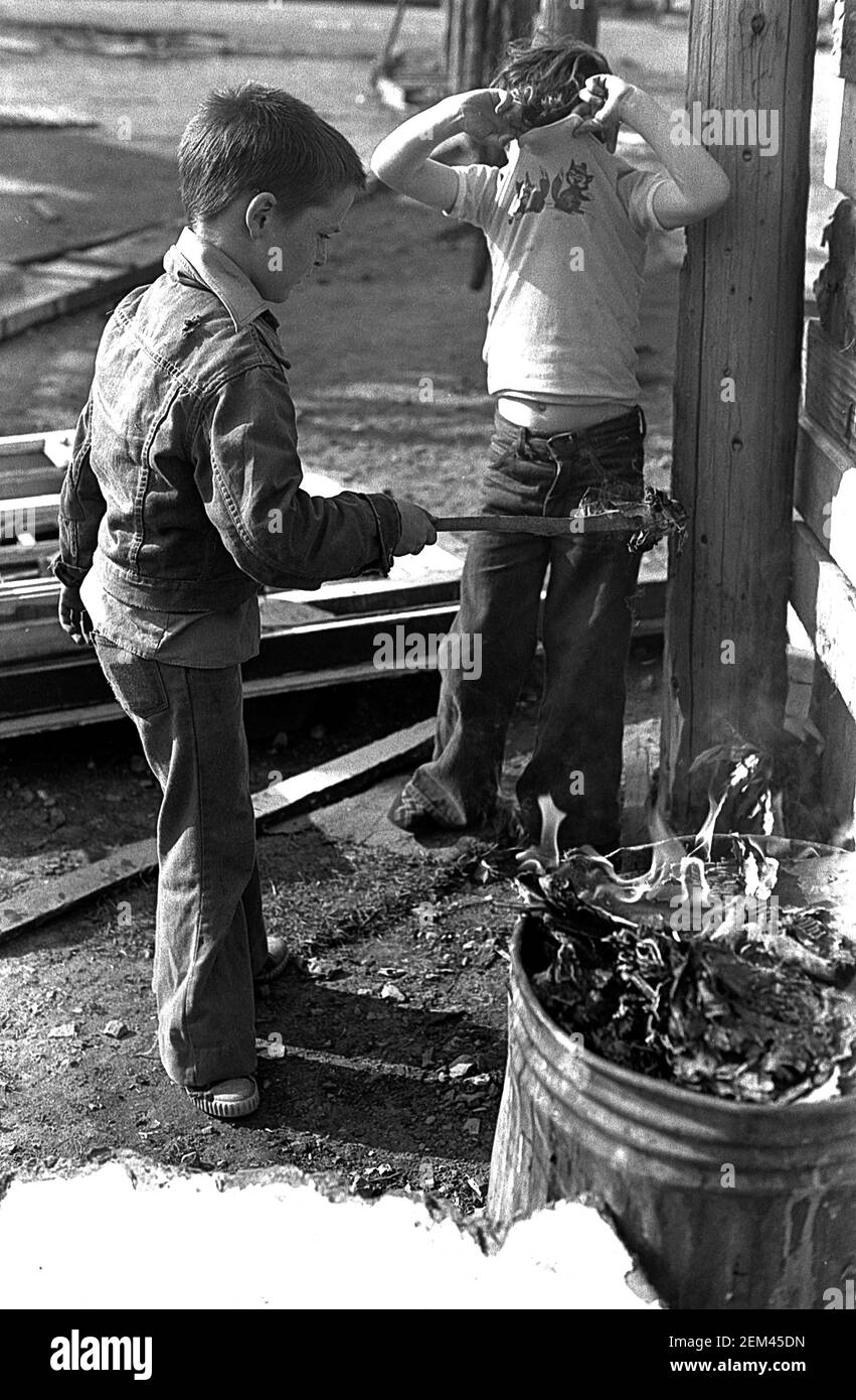 Childrens Adventure Playground boys playing with fire Stock Photo - Alamy