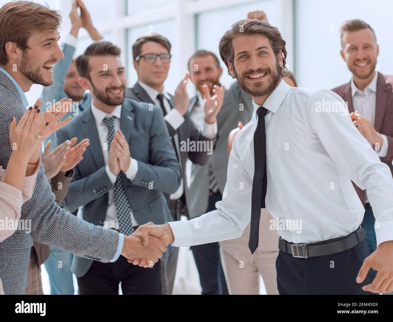 business team congratulating each other on the victory Stock Photo - Alamy