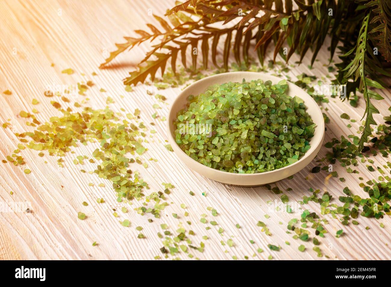 Green salt in wooden bowl Stock Photo - Alamy