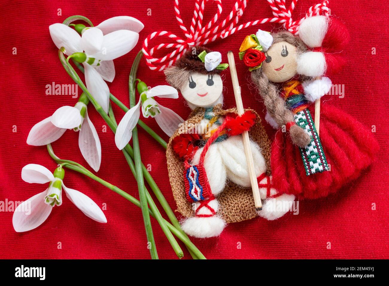 Martenitsa - traditional Bulgarian custom - red background with ...