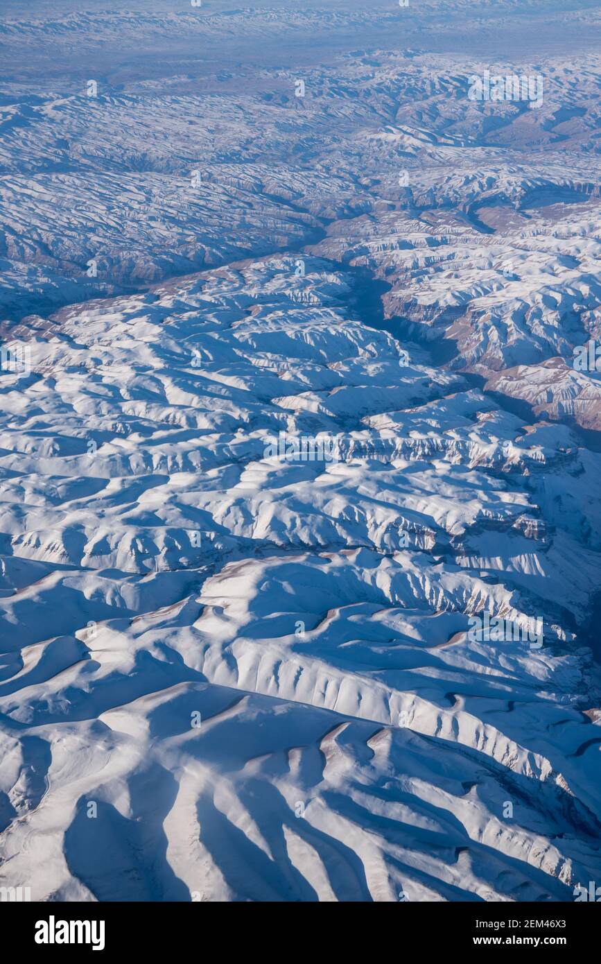 Aerial View from an Airplane. Flying above Beautiful Land at Sunrise ...