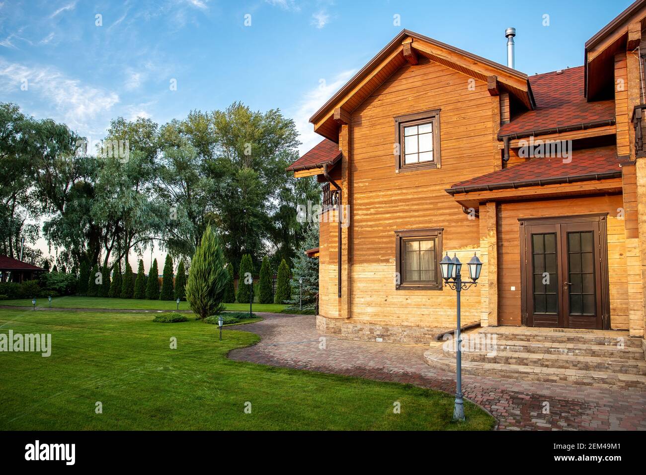 Modern wooden timber eco house villa facade during process of ...