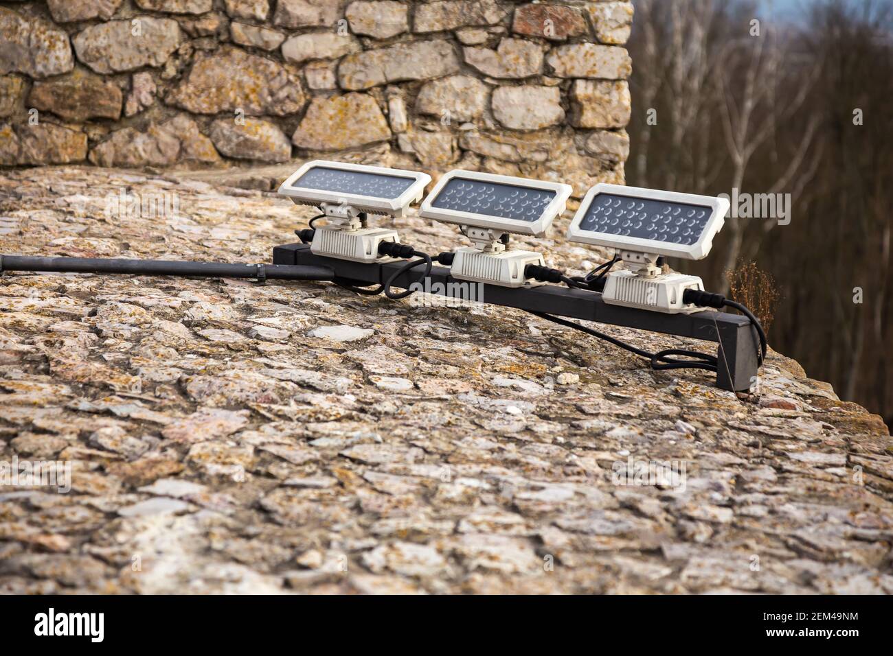 LED lamps (off) to illuminate the walls of a medieval castle. Natural ...