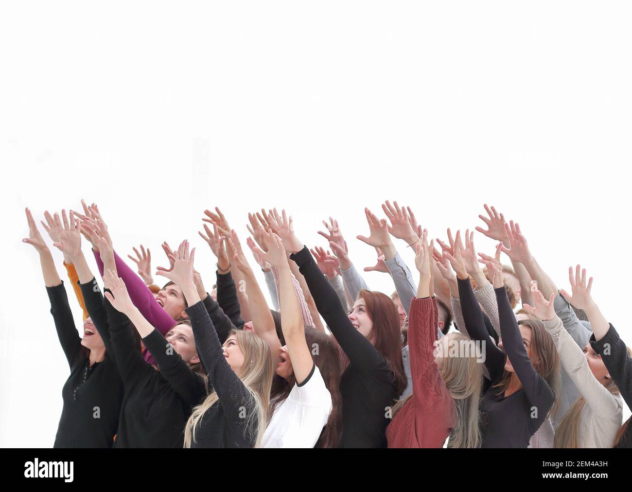 group of diverse young people holding their hands up Stock Photo - Alamy