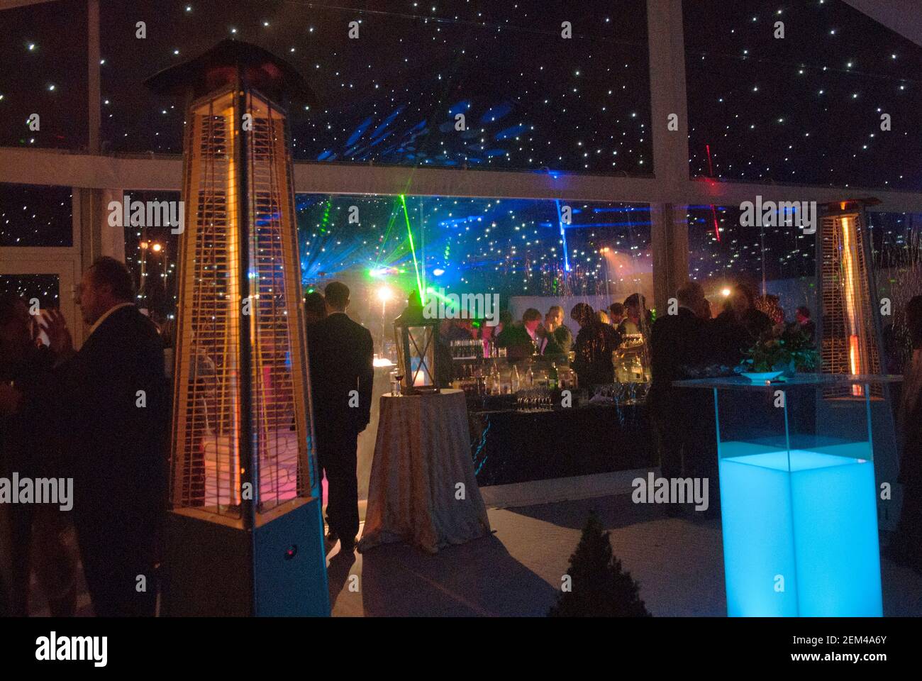 Rich people Uk private party night club set up in the garden of large ...