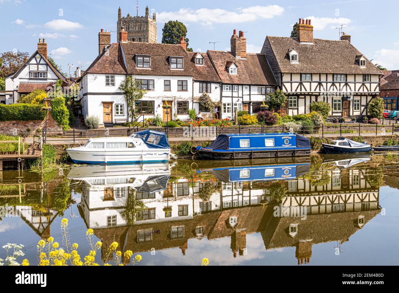 The Abbey and old cottages in St Marys Road beside the Mill Avon in the ...