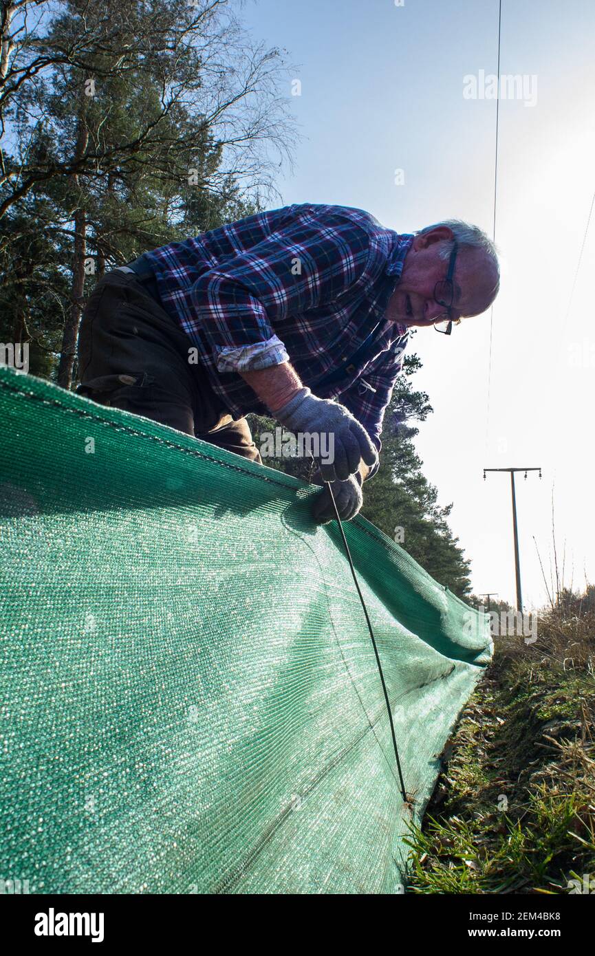 Jerichow, Germany. 24th Feb, 2021. Eckard Splieth is helping to build a ...