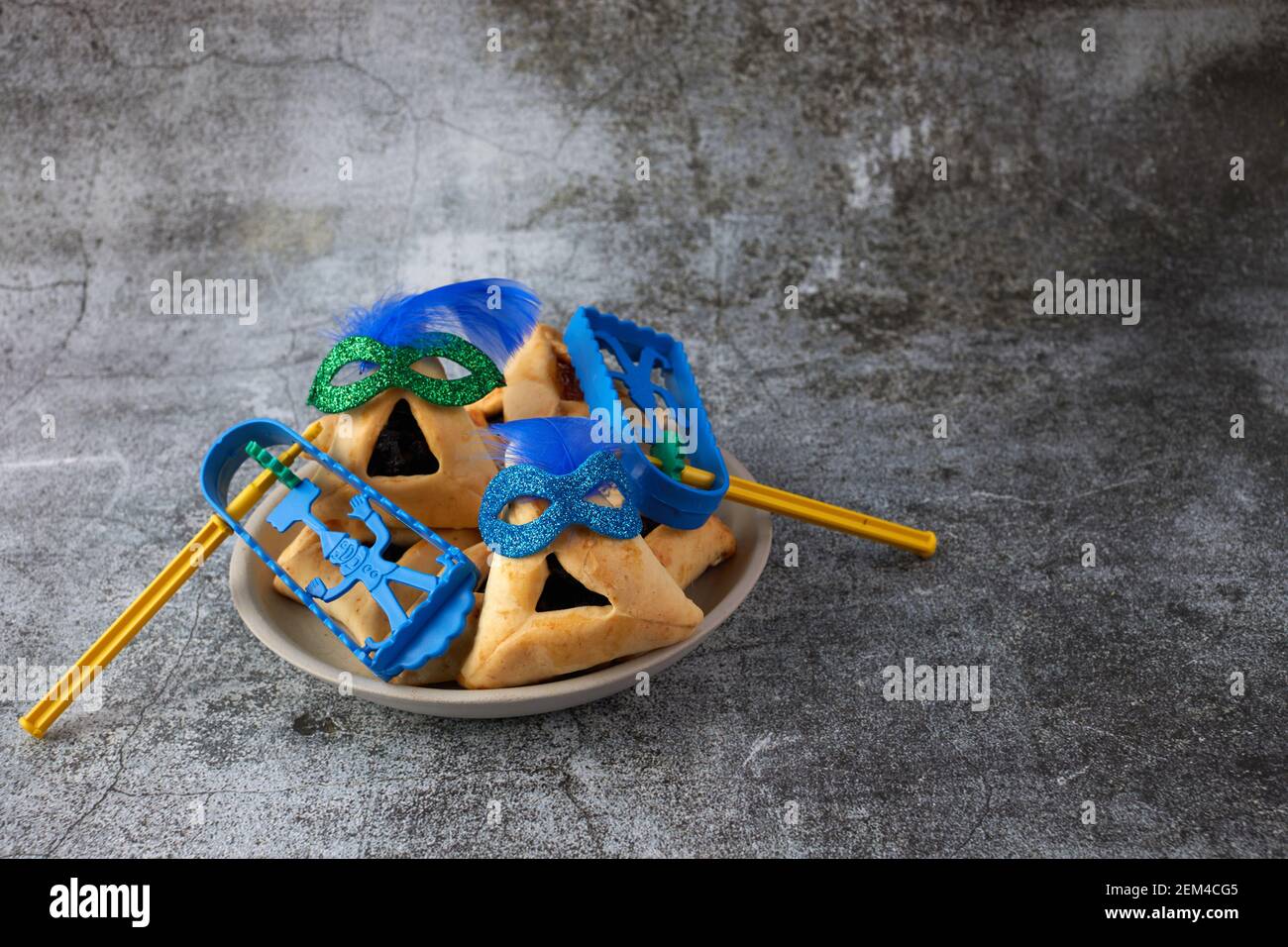 Purim celebration concept with hamantashen cookies, Purim mask and toy ...
