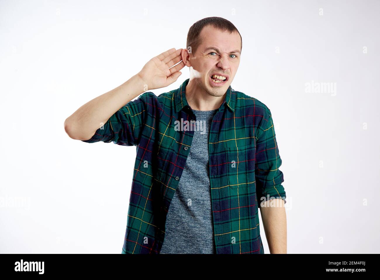 Man does not hear well, makes gestures with his hands Stock Photo - Alamy
