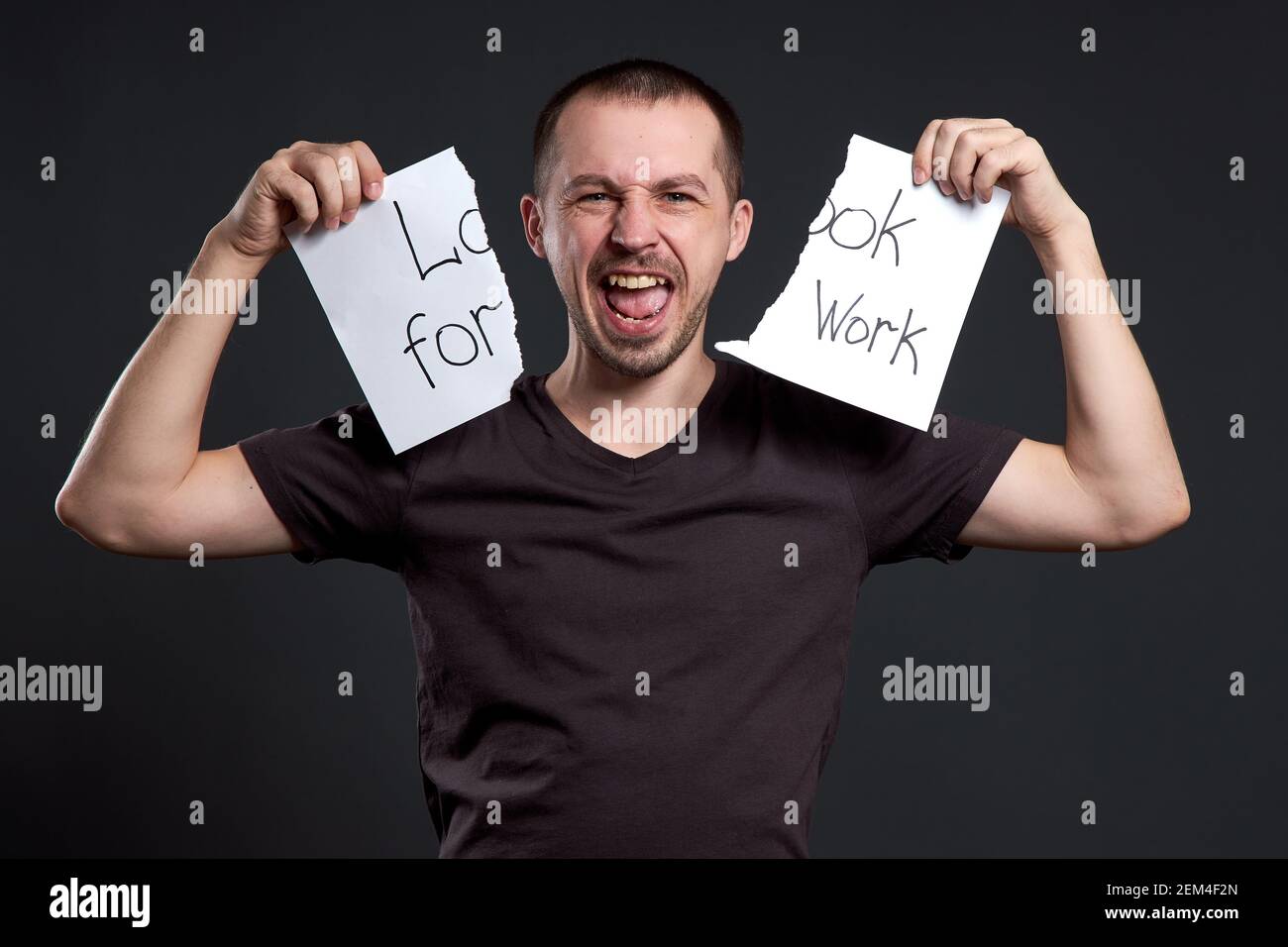 Tearing up a poster hi-res stock photography and images - Alamy