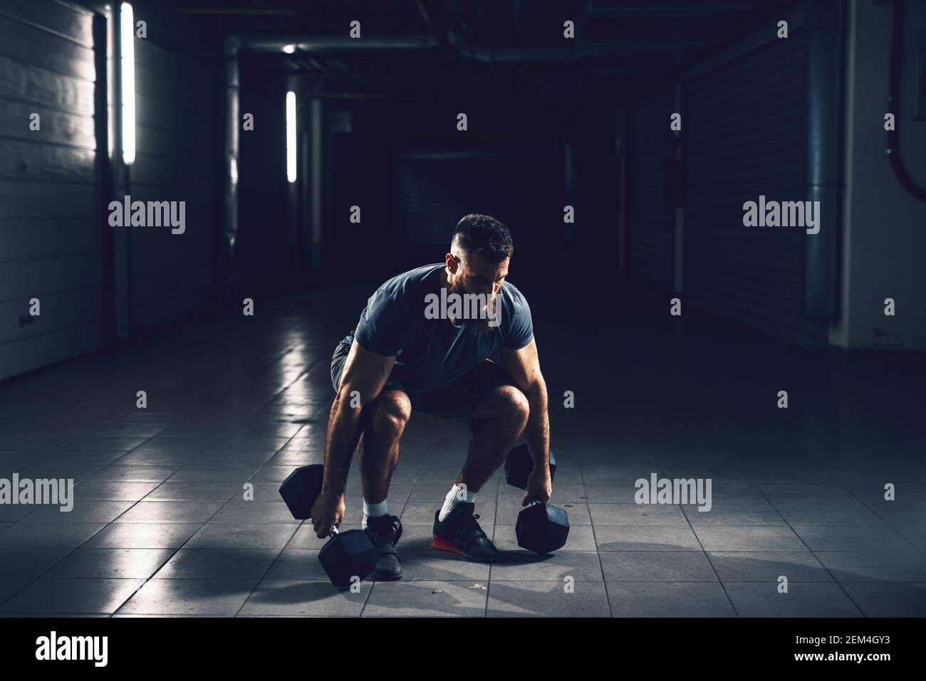 Close up view of focussed hardworking active fitness strong muscular ...