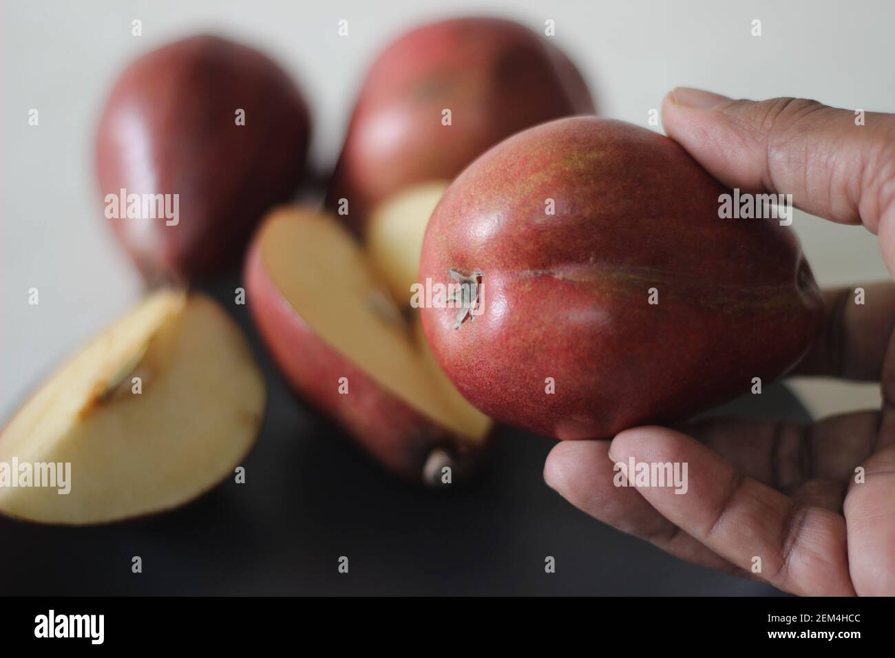 The Red Bartlett pear carries a true pyriform pear shape. A rounded ...