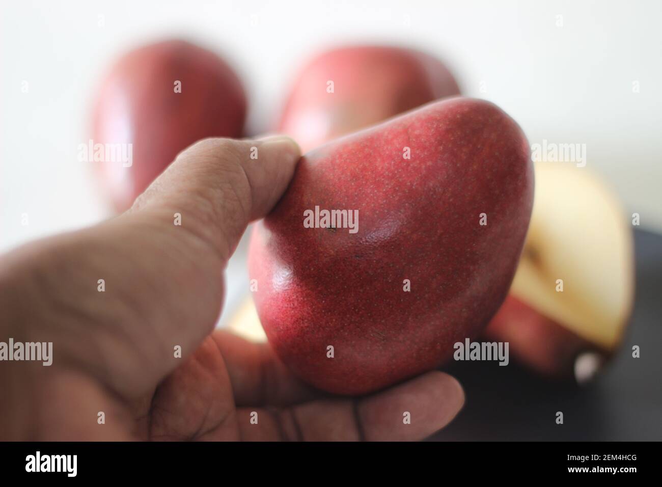 The Red Bartlett pear carries a true pyriform pear shape. A rounded ...