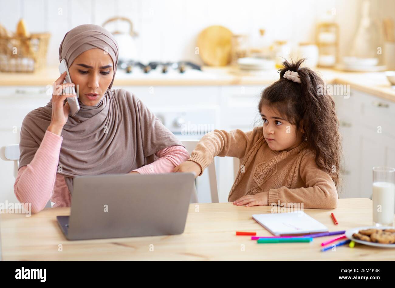 Mother child asking for attention hi-res stock photography and images ...