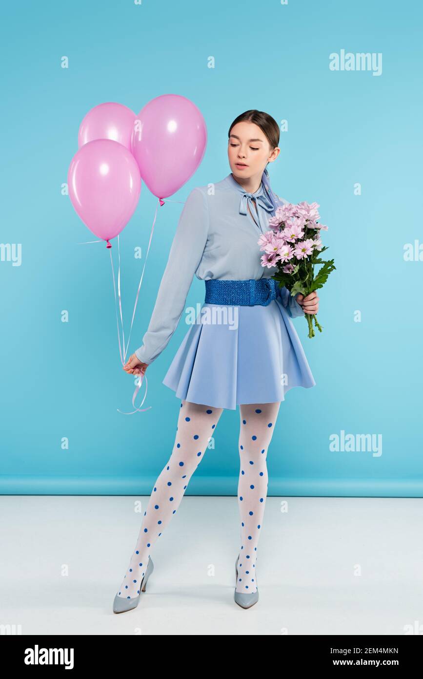 Fashion model blue blouse pink skirt hi-res stock photography and ...