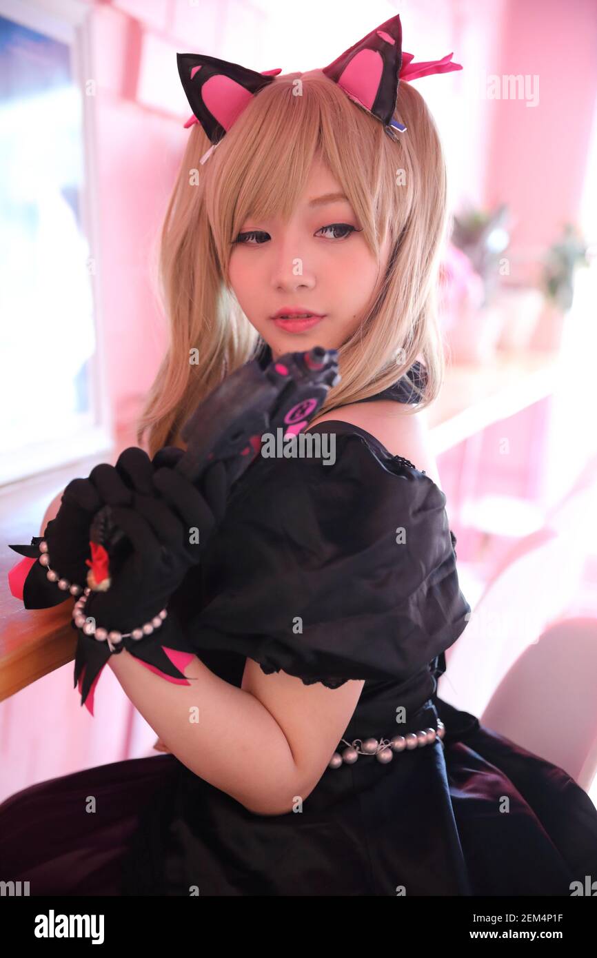 Japan anime cosplay , portrait of girl cosplay in pink room background ...