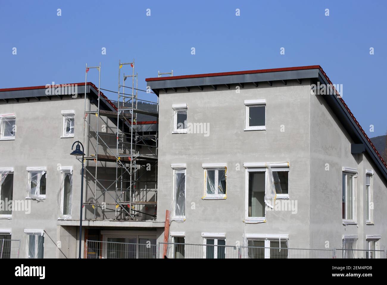 New construction with finished base plaster Stock Photo - Alamy