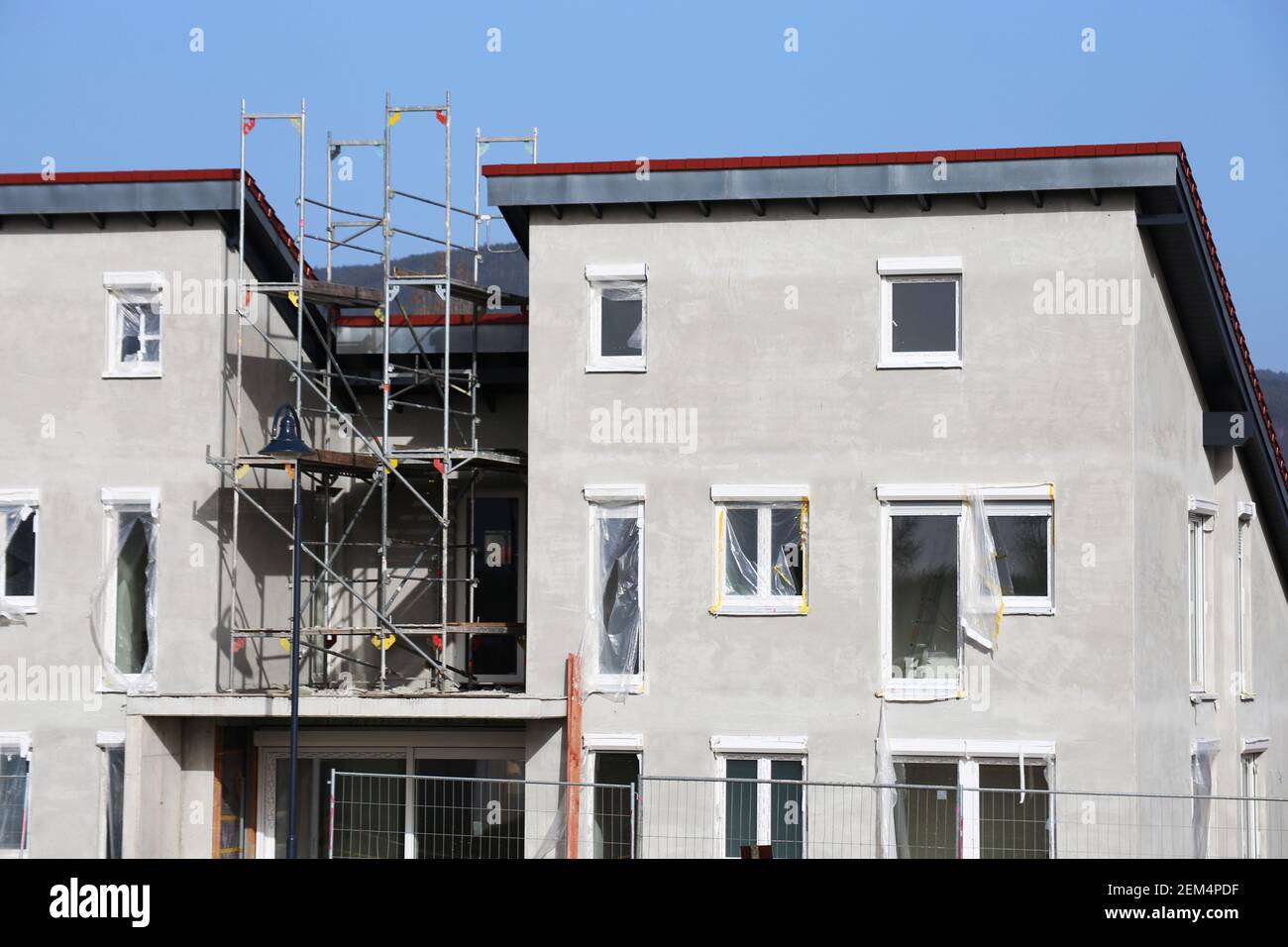 New construction with finished base plaster Stock Photo - Alamy