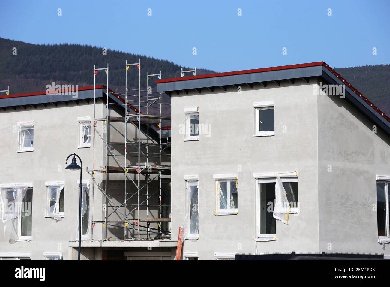 New construction with finished base plaster Stock Photo - Alamy