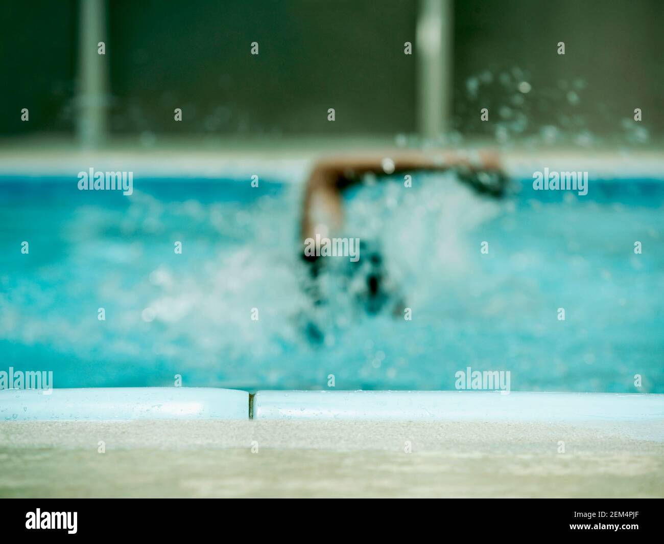 Person swimming in a swimming pool Stock Photo - Alamy