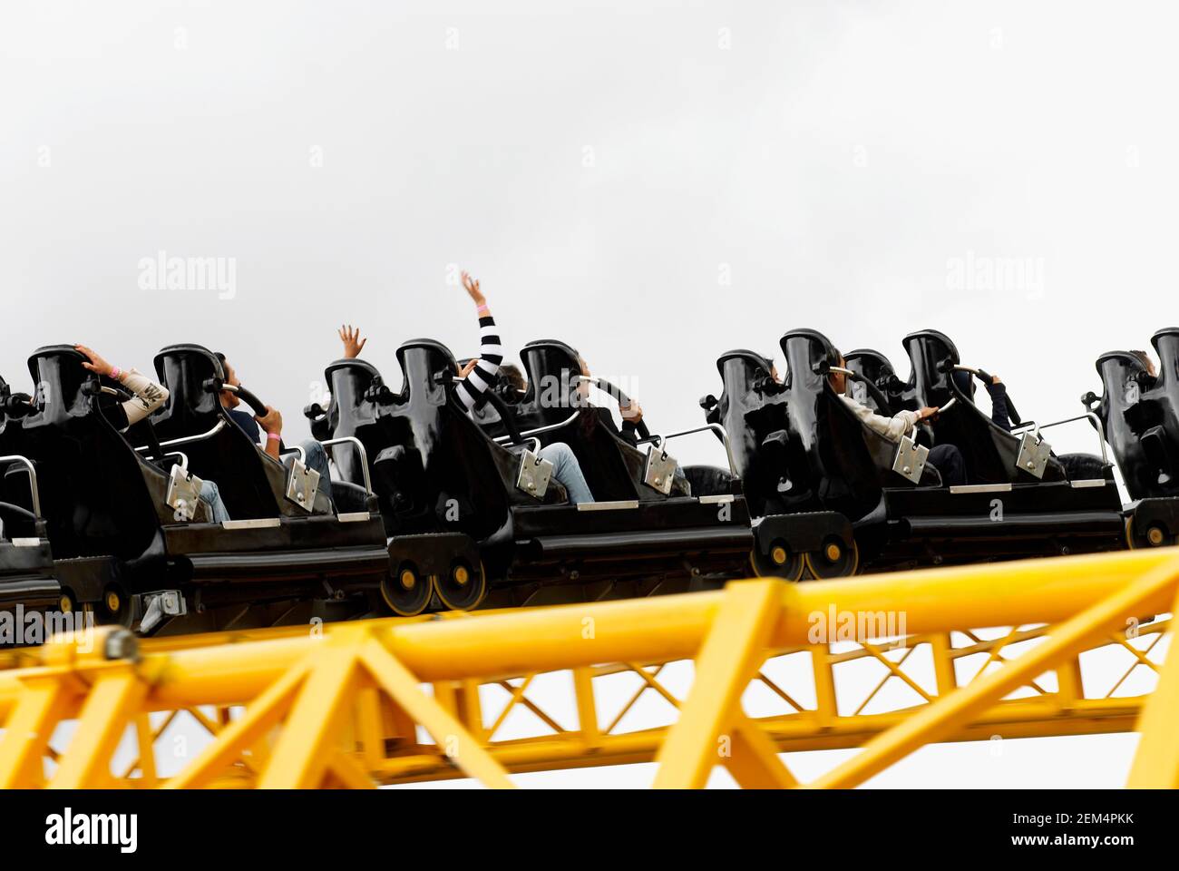 Group people on rollercoaster ride hi-res stock photography and images ...