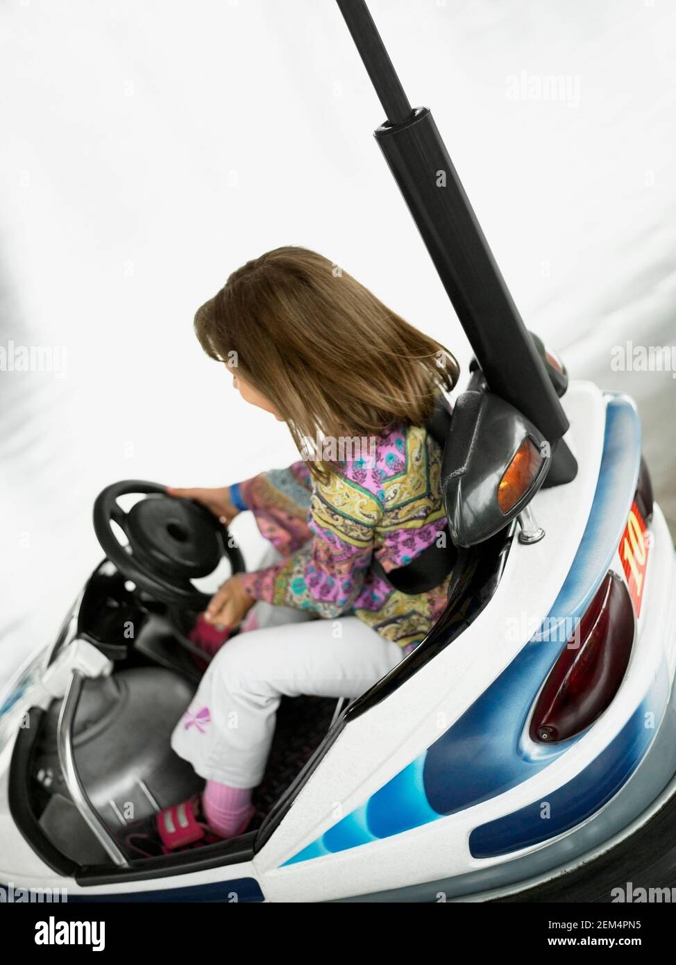 Girl riding a bumper car hi-res stock photography and images - Alamy
