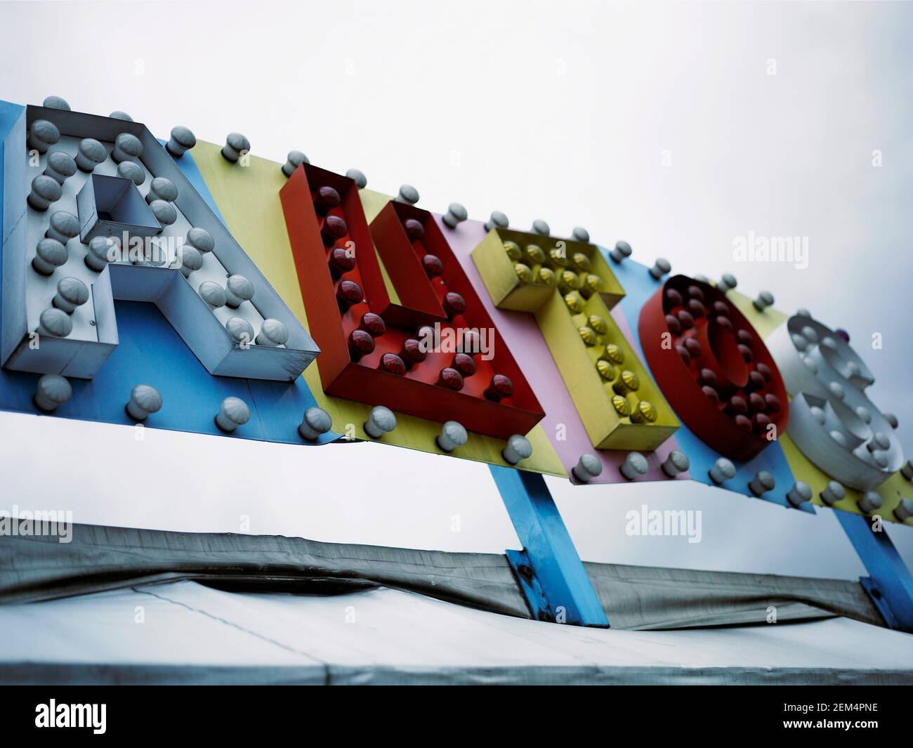 Low angle view of an amusement park signboard Stock Photo - Alamy
