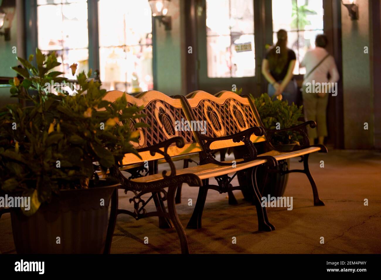 Empty benches in a hall Stock Photo - Alamy