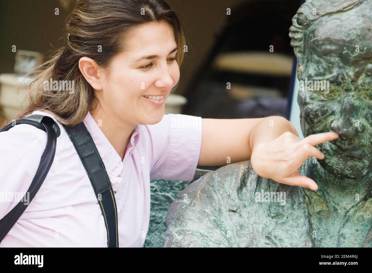 Touching a statue hi-res stock photography and images - Alamy