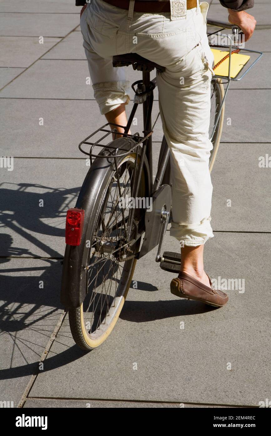 Person riding a bicycle hi-res stock photography and images - Alamy