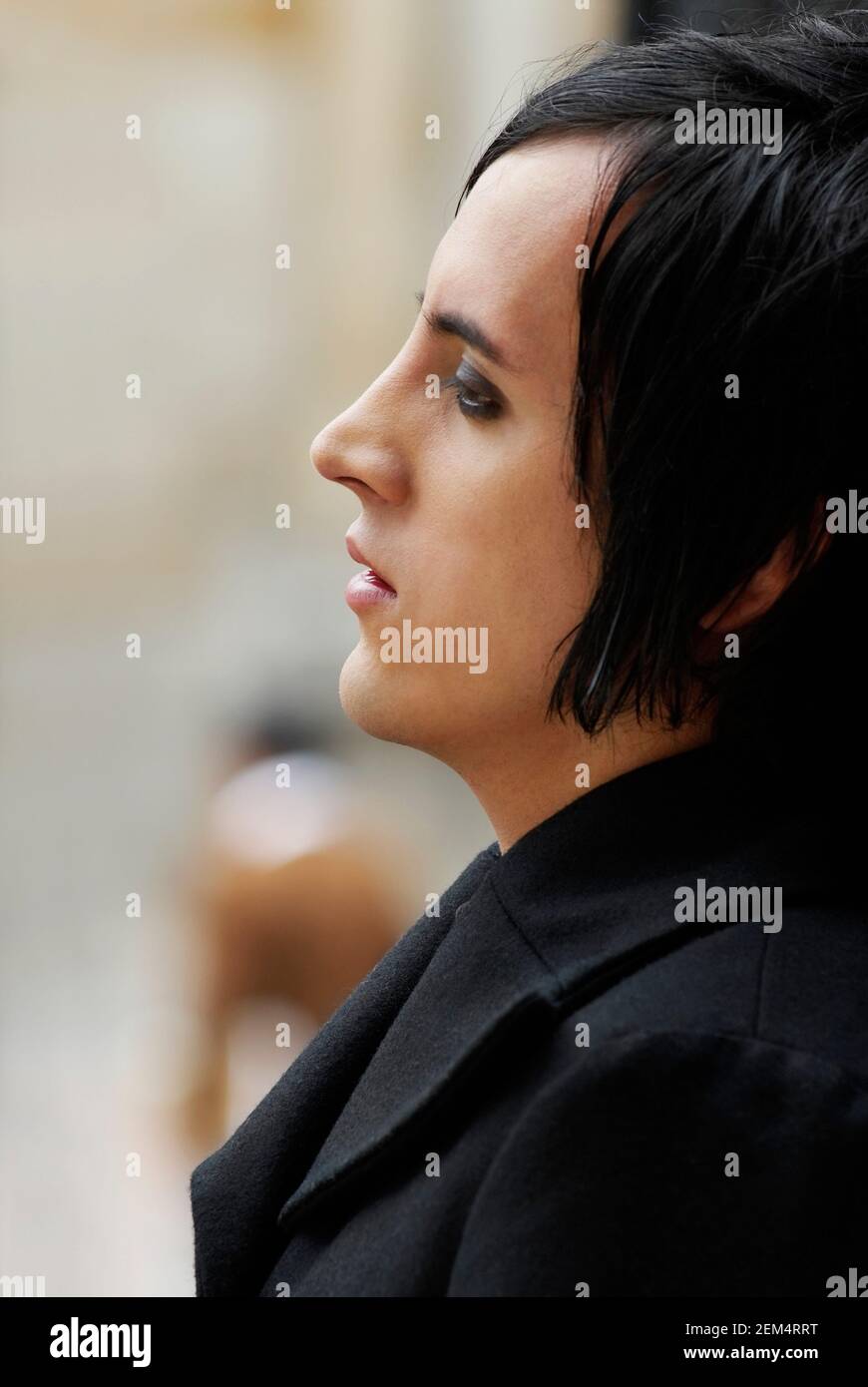 Side profile of a young man thinking Stock Photo - Alamy