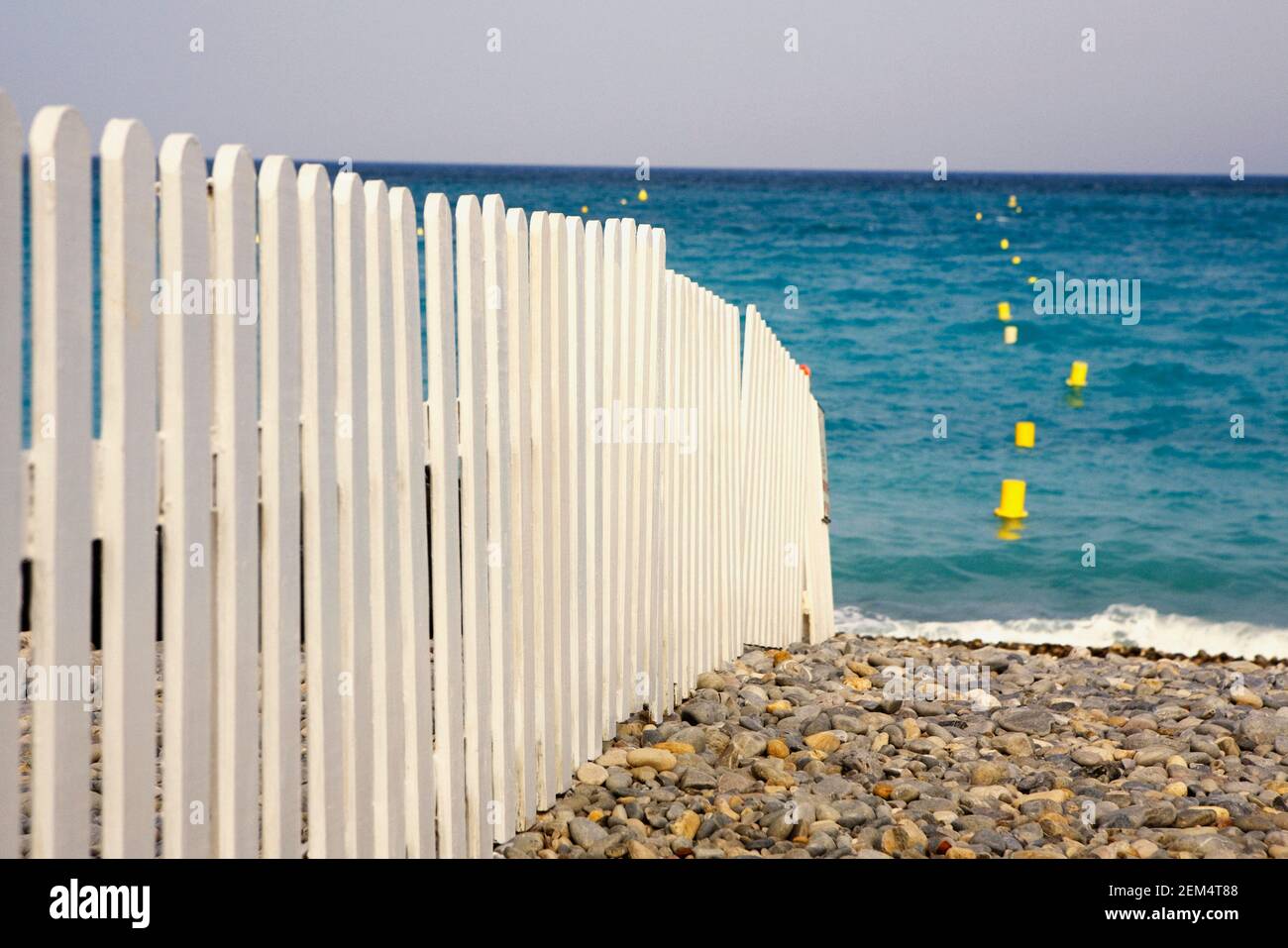 Fence on the beach Stock Photo - Alamy