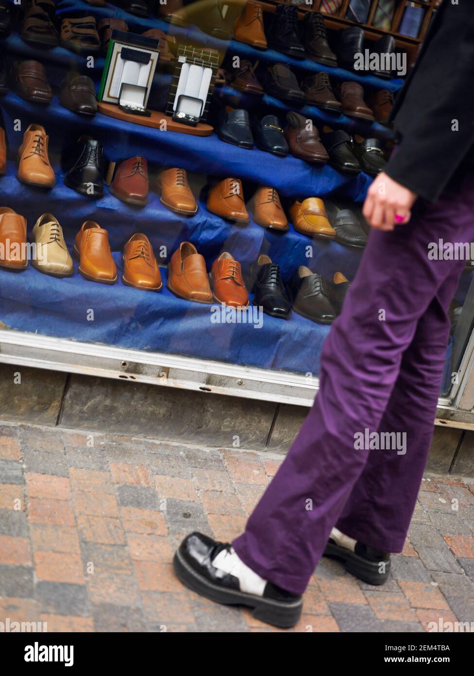 Low section view of a person standing in front of a market stall Stock ...