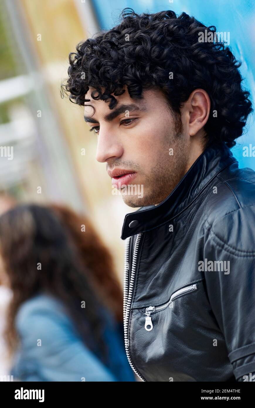 Side profile of a young man thinking Stock Photo - Alamy