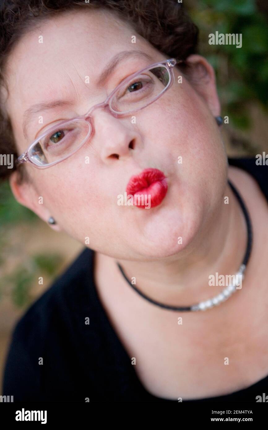 Close up woman puckering lips hi-res stock photography and images - Alamy
