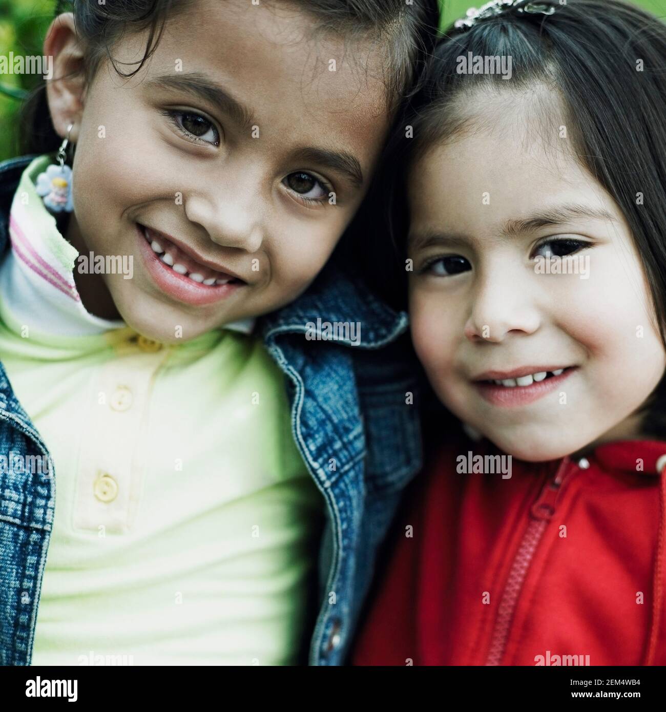 Portrait of two girls smiling Stock Photo - Alamy