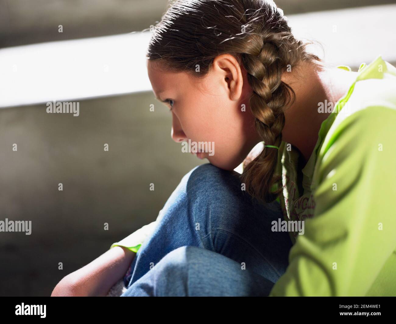 Side profile of a girl thinking Stock Photo - Alamy