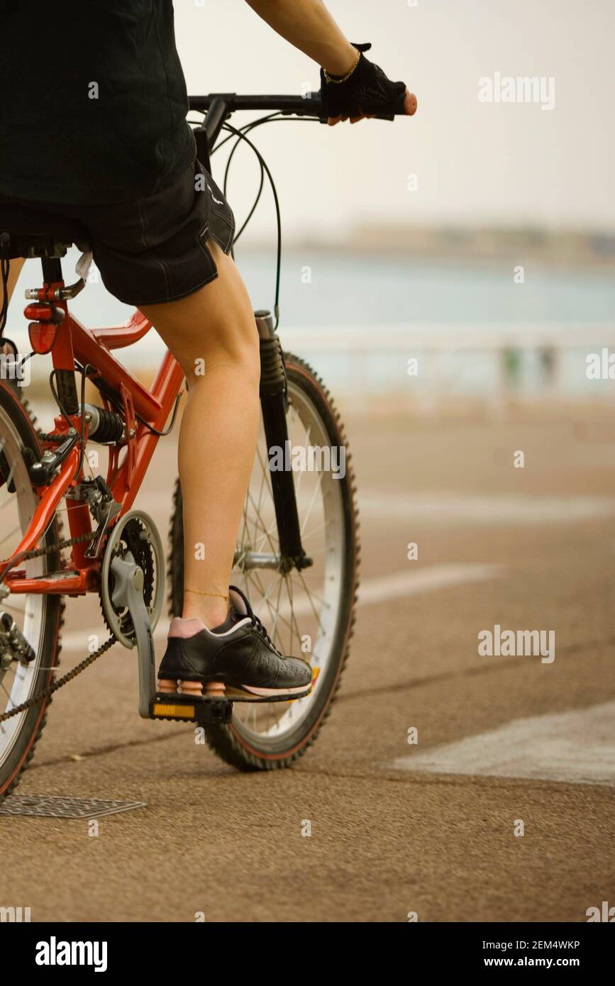 Person riding a bicycle hi-res stock photography and images - Alamy