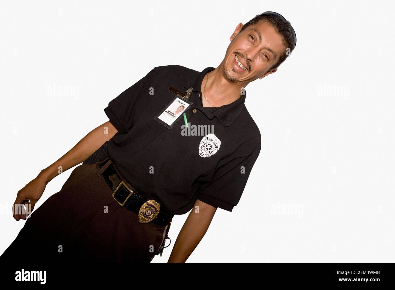 Portrait of a security guard standing in front of a painted wall and ...