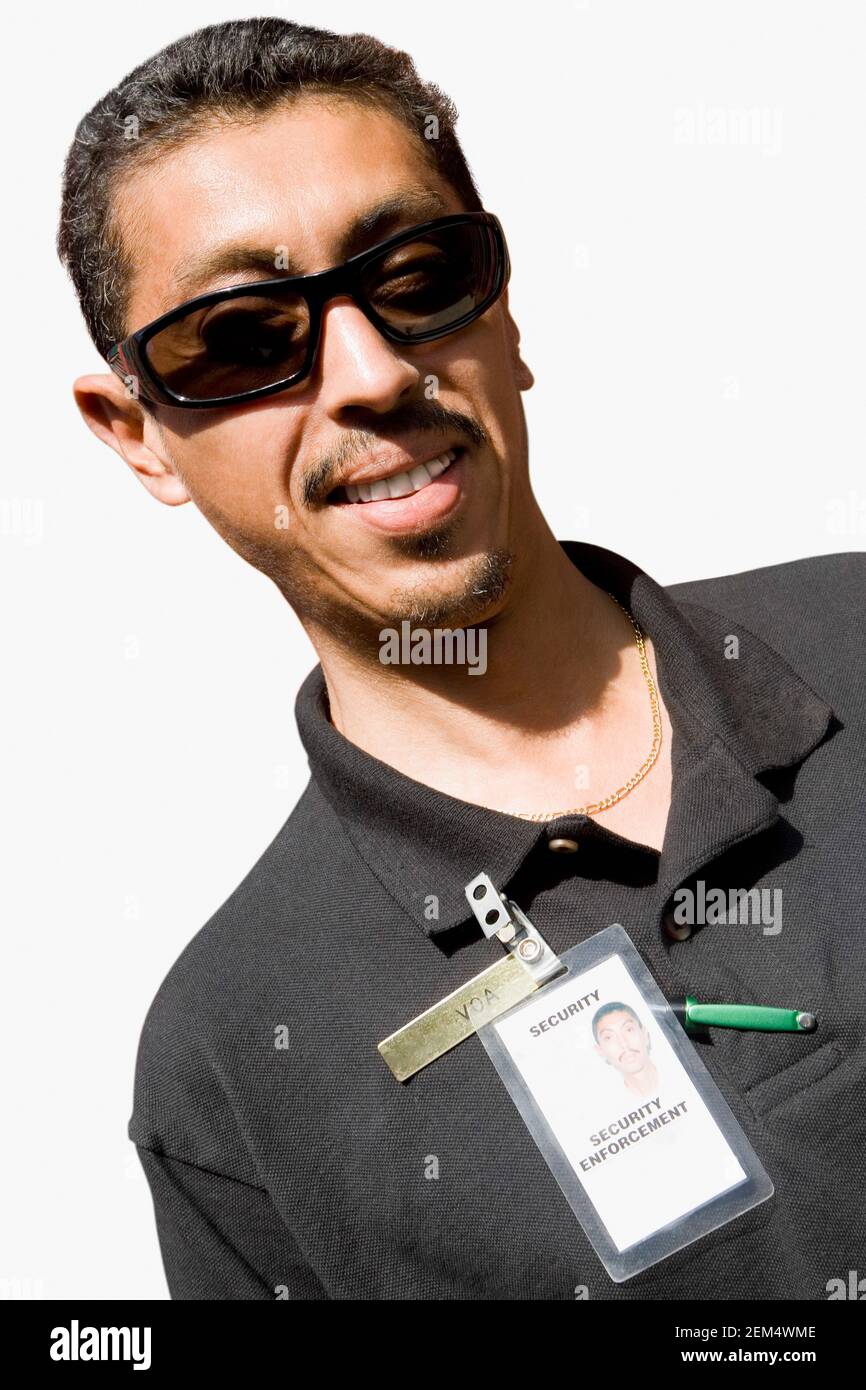 Portrait of a security guard smiling Stock Photo - Alamy