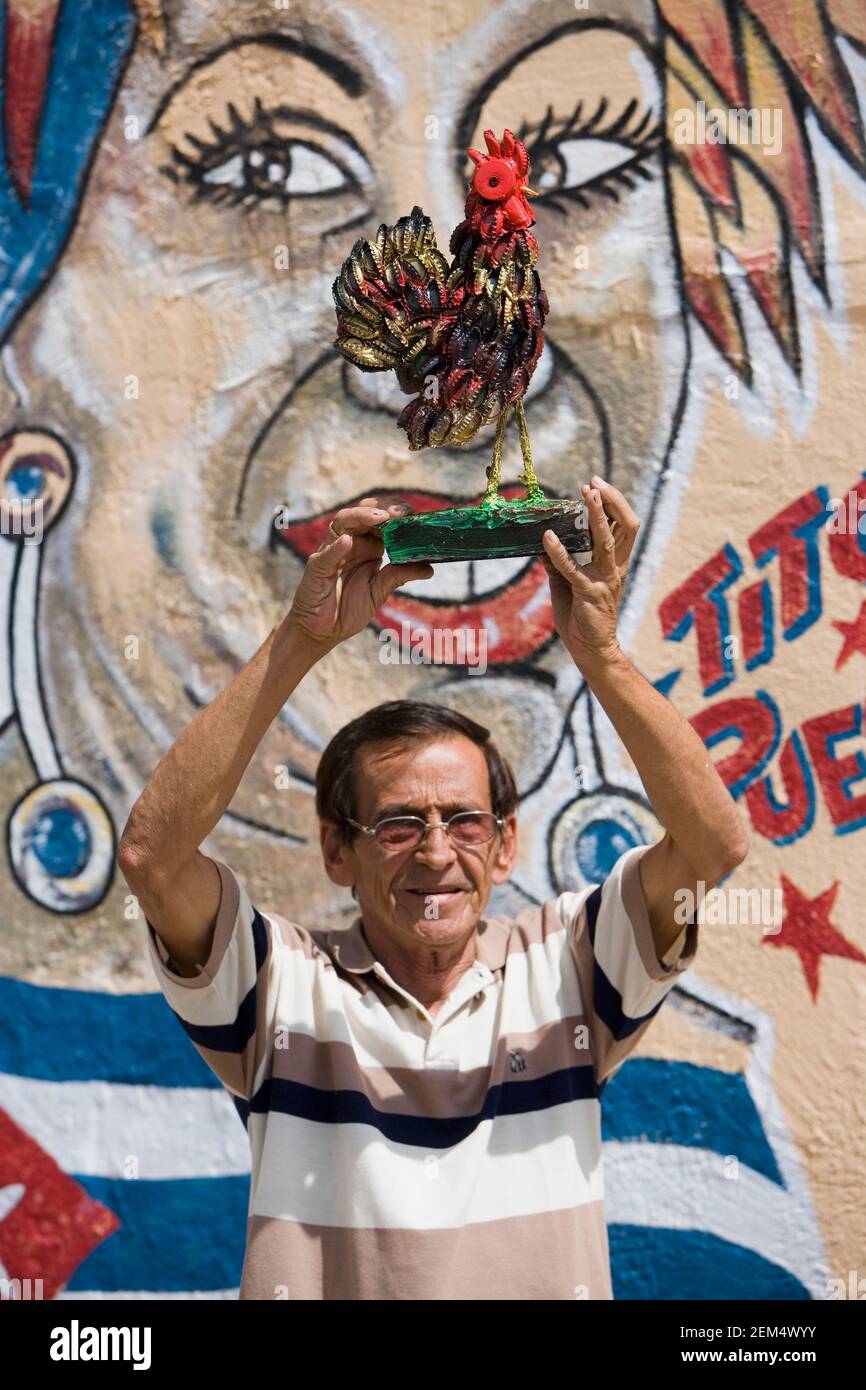 Man with a rooster hi-res stock photography and images - Alamy