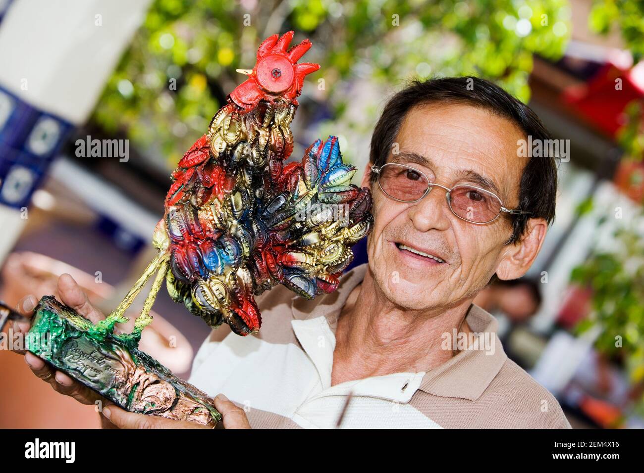 Man with a rooster hi-res stock photography and images - Alamy