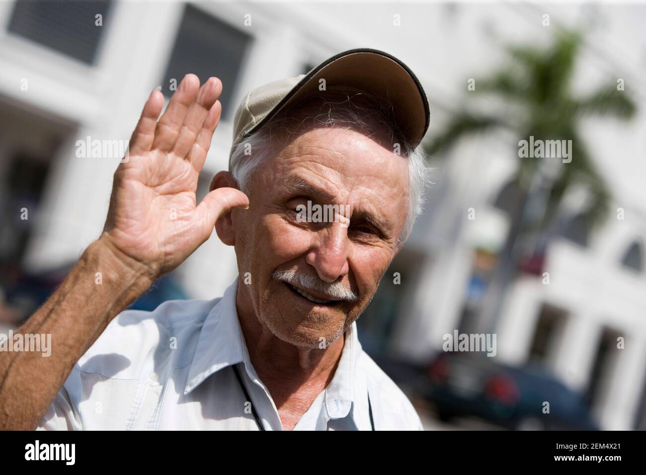 Senior man waving hi-res stock photography and images - Alamy