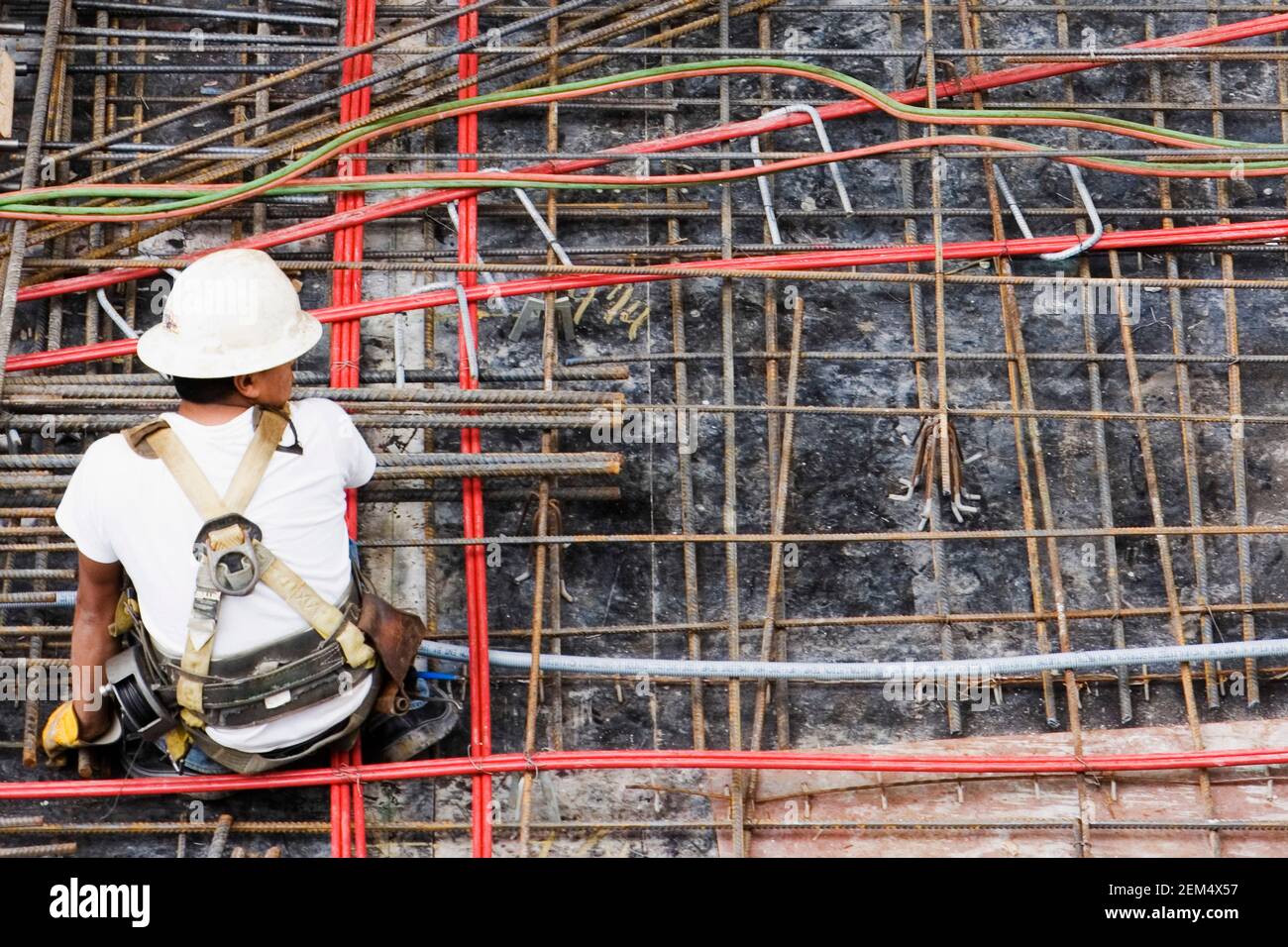 High angle view of a construction worker working at a construction site ...
